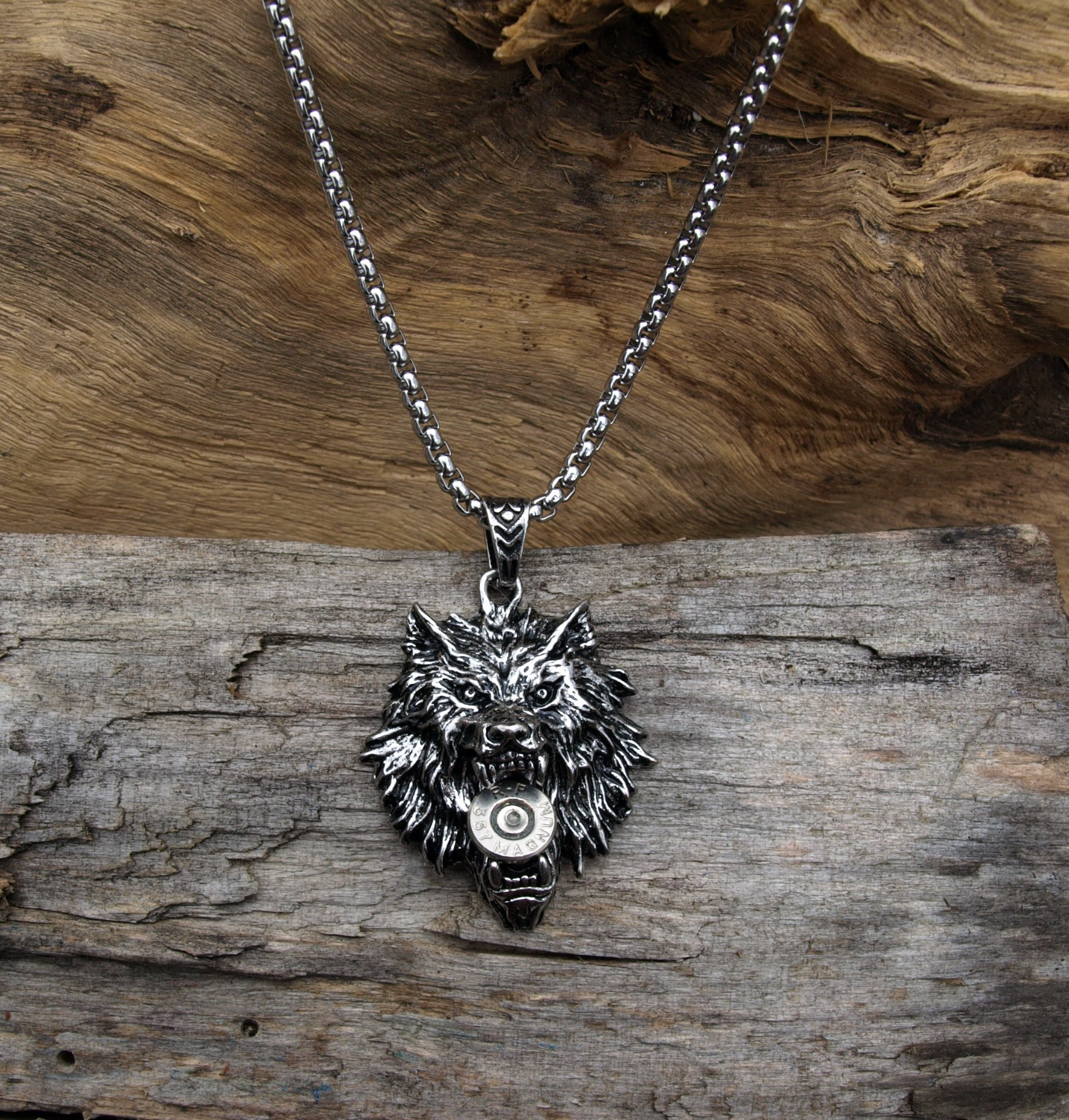 MN-300 Stainless Steel Wolf Pendant with Bullet Charm. Optional Crystal.