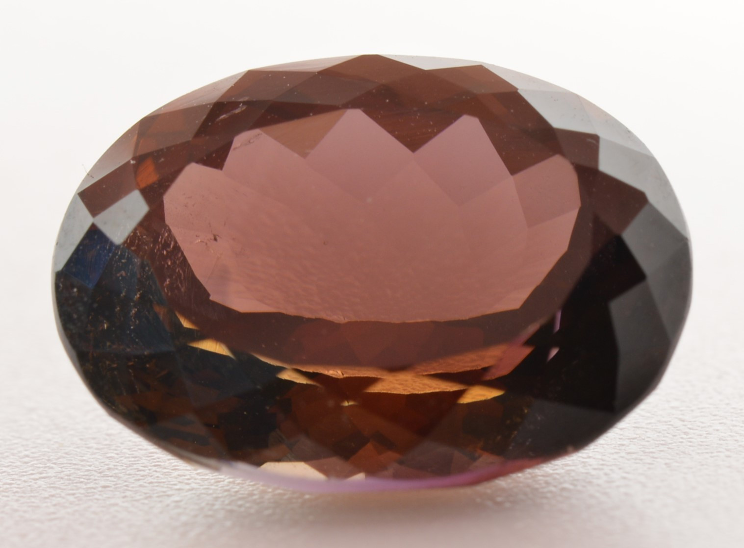 Axinite: Magnetism and Color