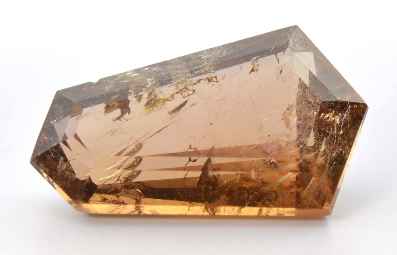 Axinite: Magnetism and Color